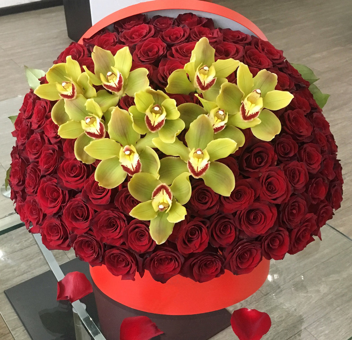 100 red roses and orchids design in a box — Luxury Flowers Miami